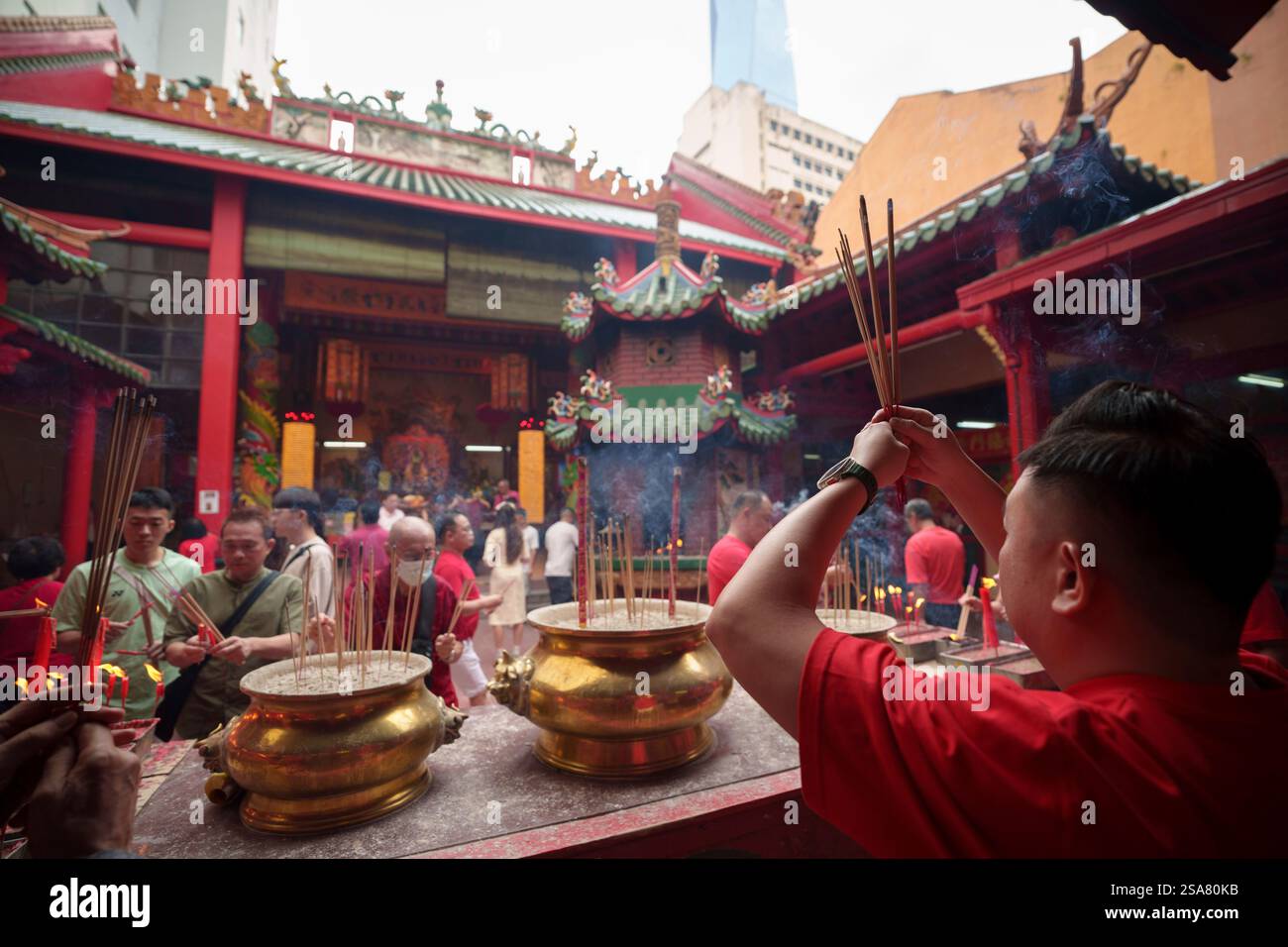 Malaysian ethnic Chinese pray on the first day of Lunar New Year at ...