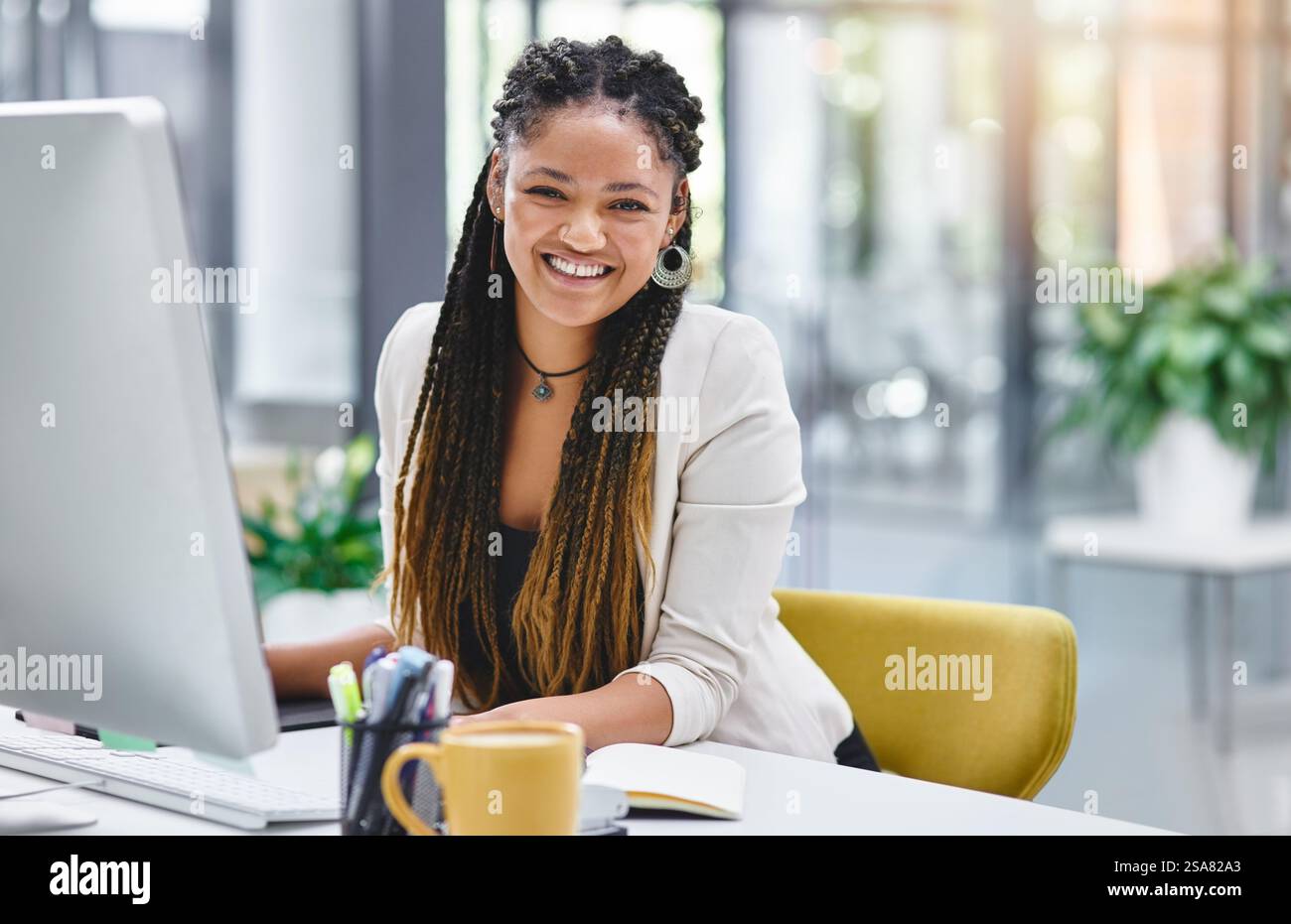 Portrait, happy secretary and business woman in creative office for ...
