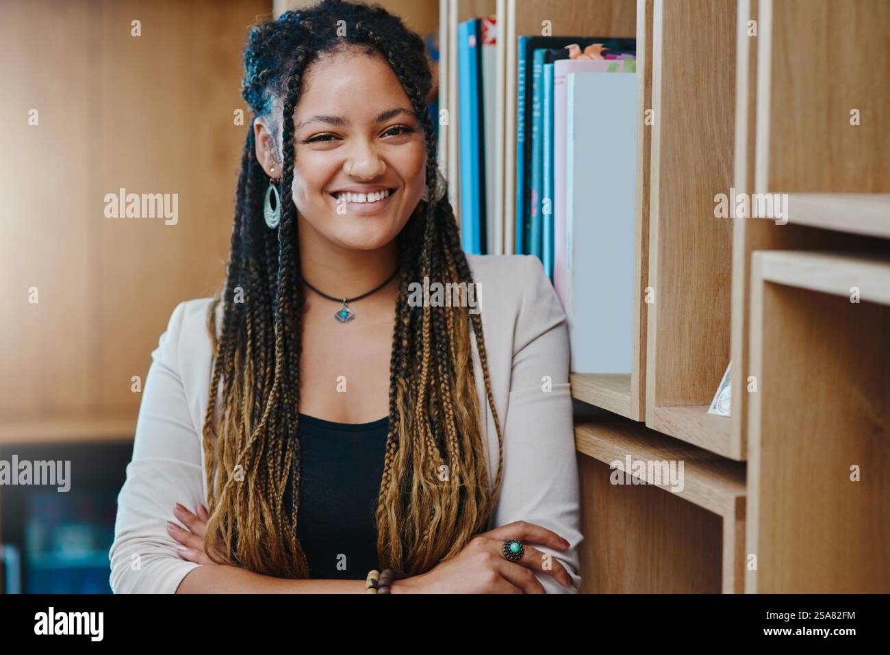 Portrait, creative and woman with arms crossed, office and smile for ...