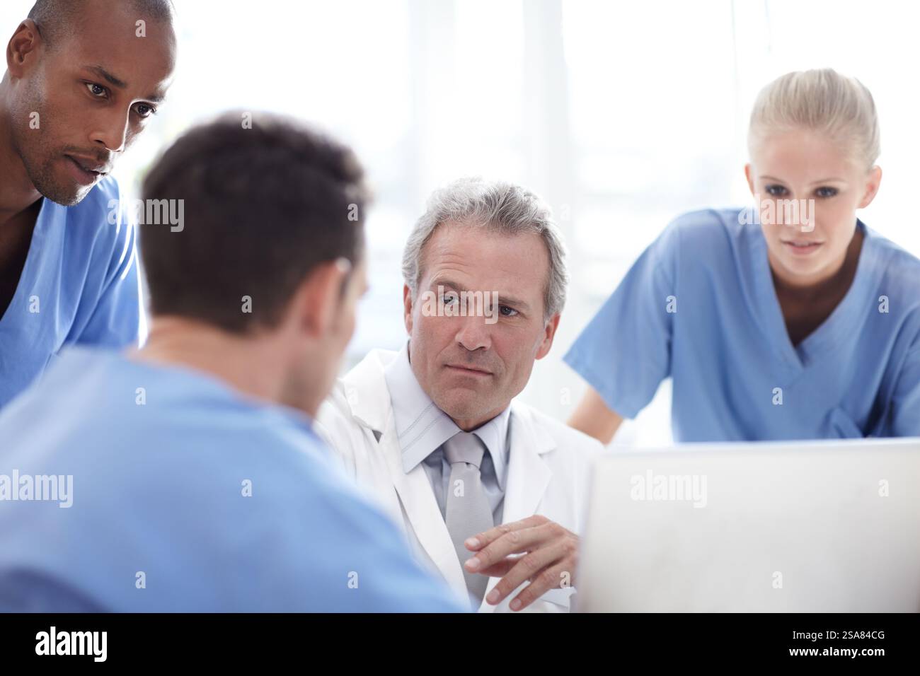 Laptop, medical and team planning for healthcare training, discussion ...