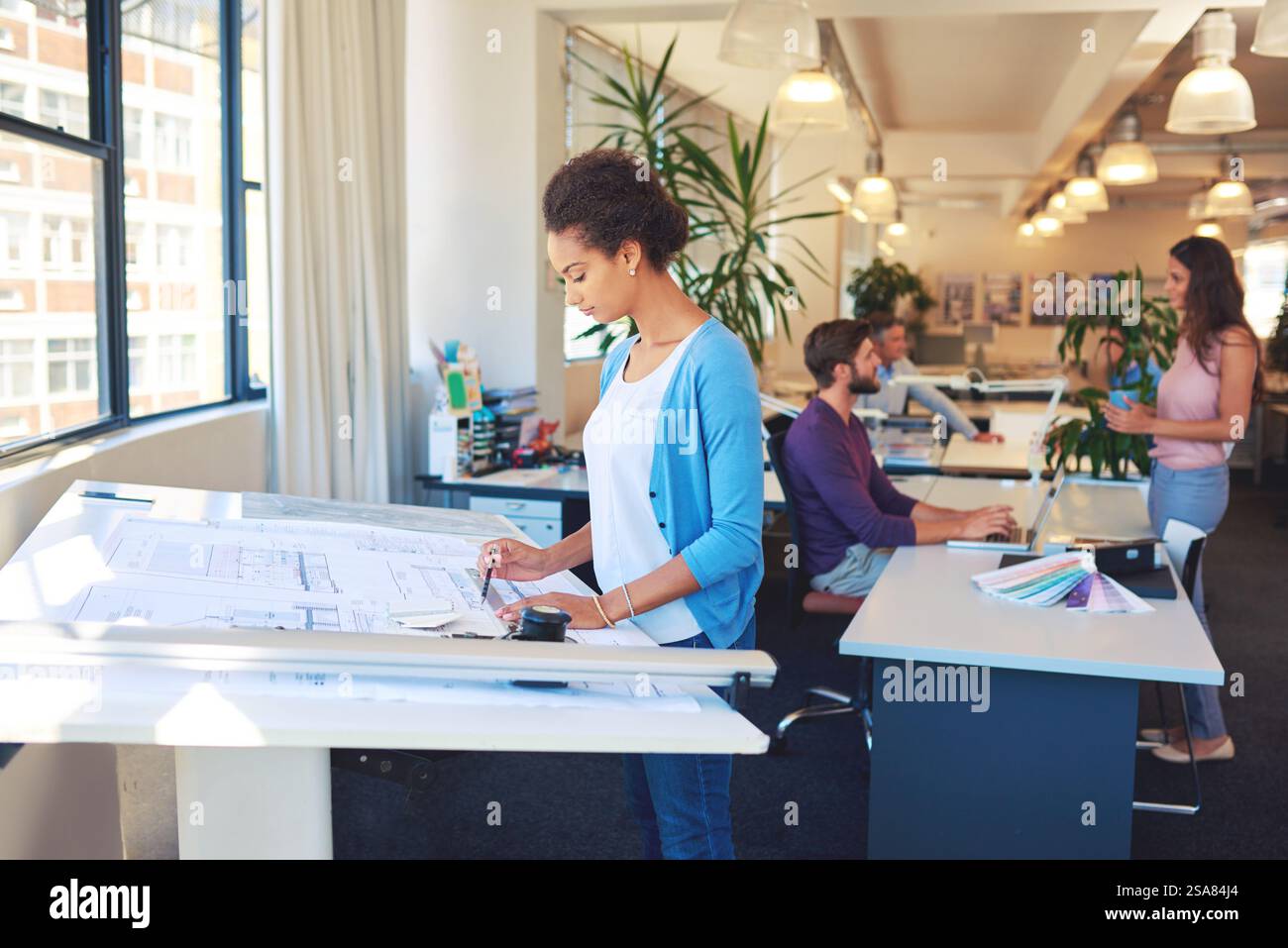 Business woman, interior designer and writing with blueprint for ...