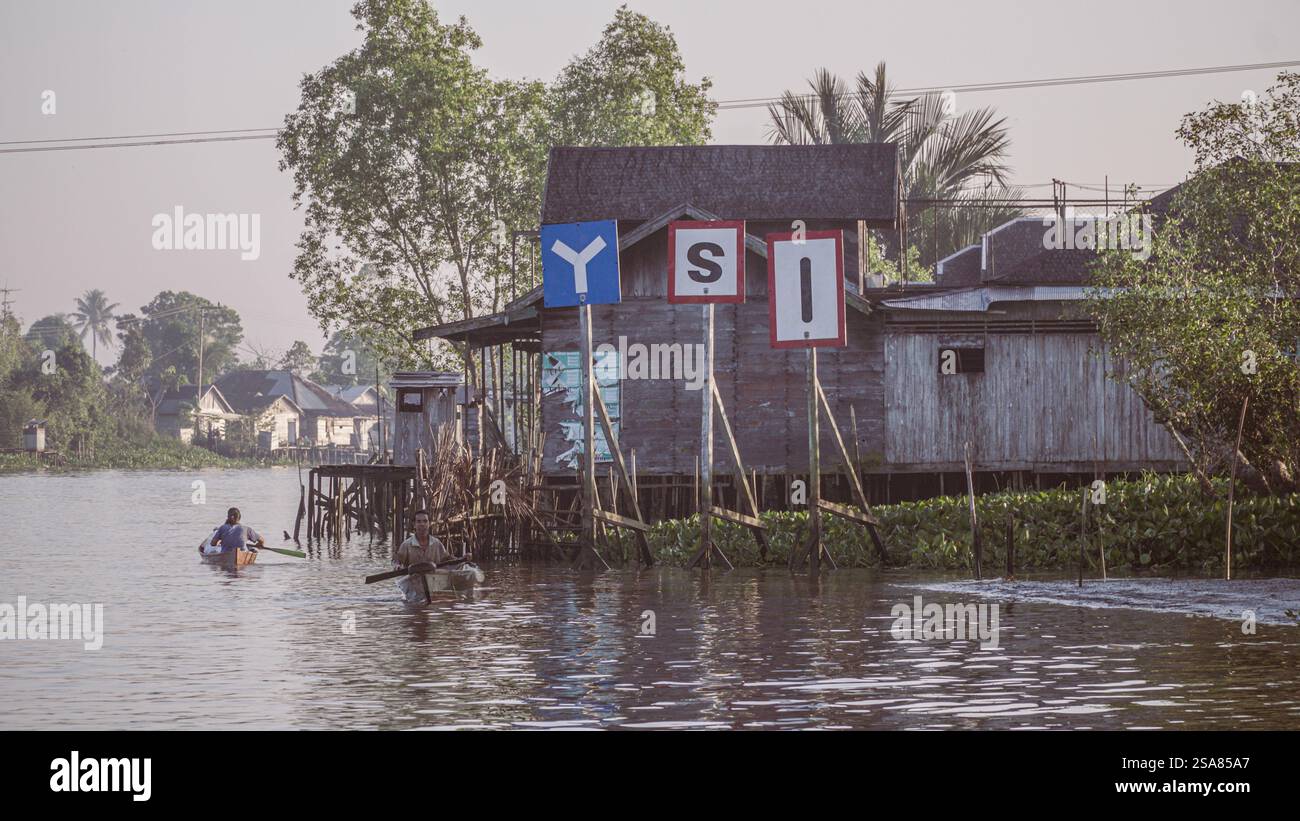 Banjarmasin, a city renowned for its river transport, features a ...