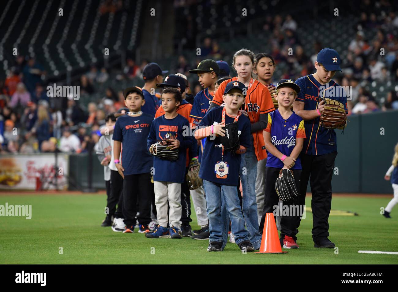 Fans enjoying time on the field during the 2025 Houston Astros FanFest ...