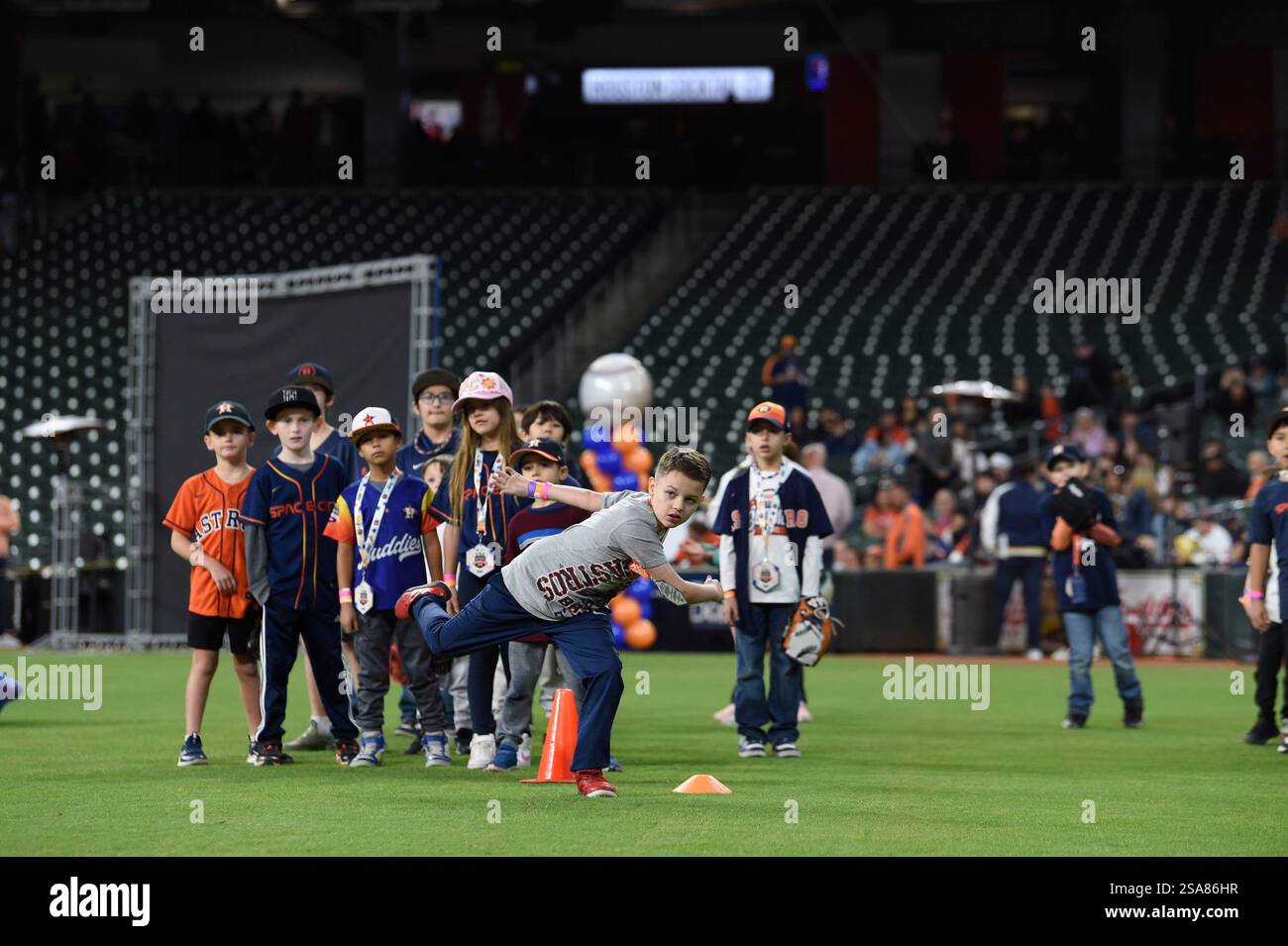 Fans enjoying time on the field during the 2025 Houston Astros FanFest ...