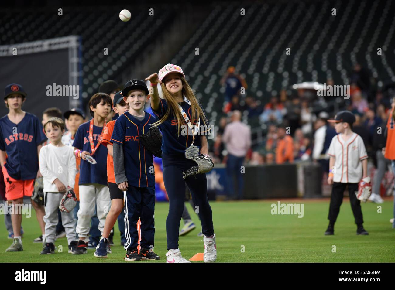 Fans enjoying time on the field during the 2025 Houston Astros FanFest ...