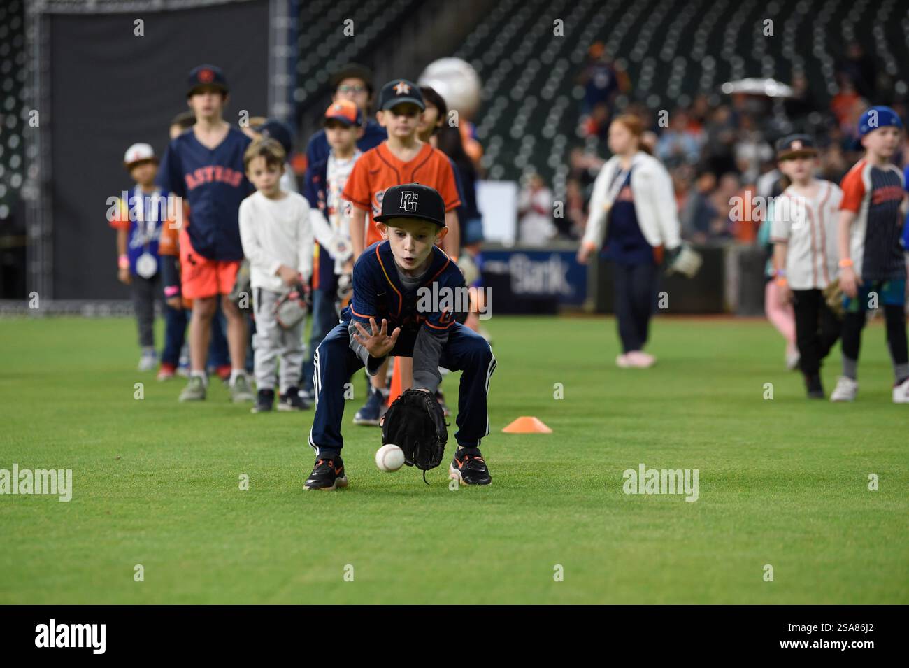 Fans enjoying time on the field during the 2025 Houston Astros FanFest ...