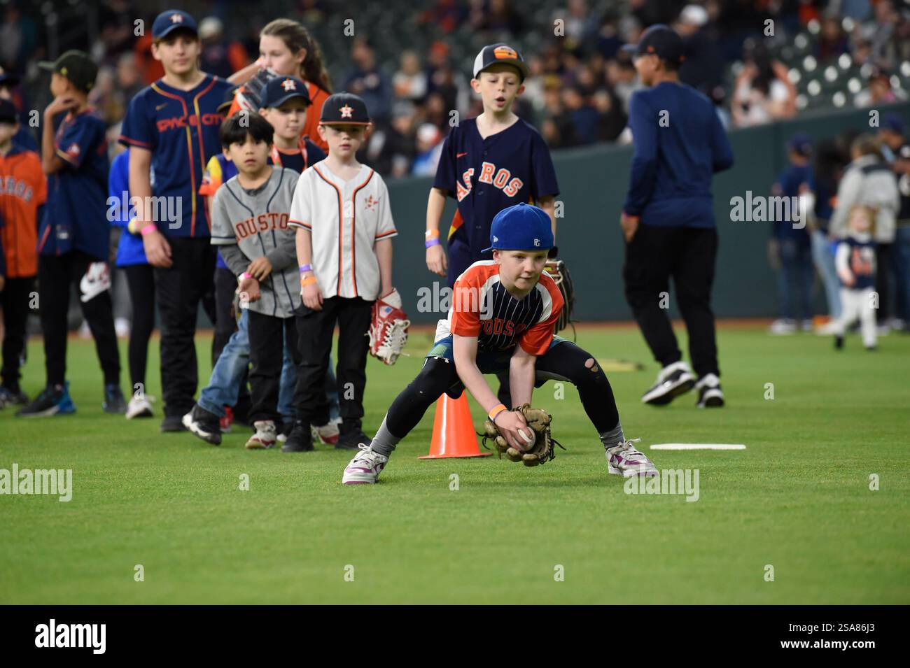 Fans enjoying time on the field during the 2025 Houston Astros FanFest ...