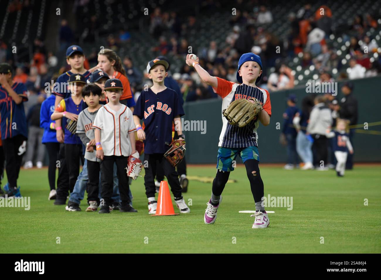 Fans enjoying time on the field during the 2025 Houston Astros FanFest ...
