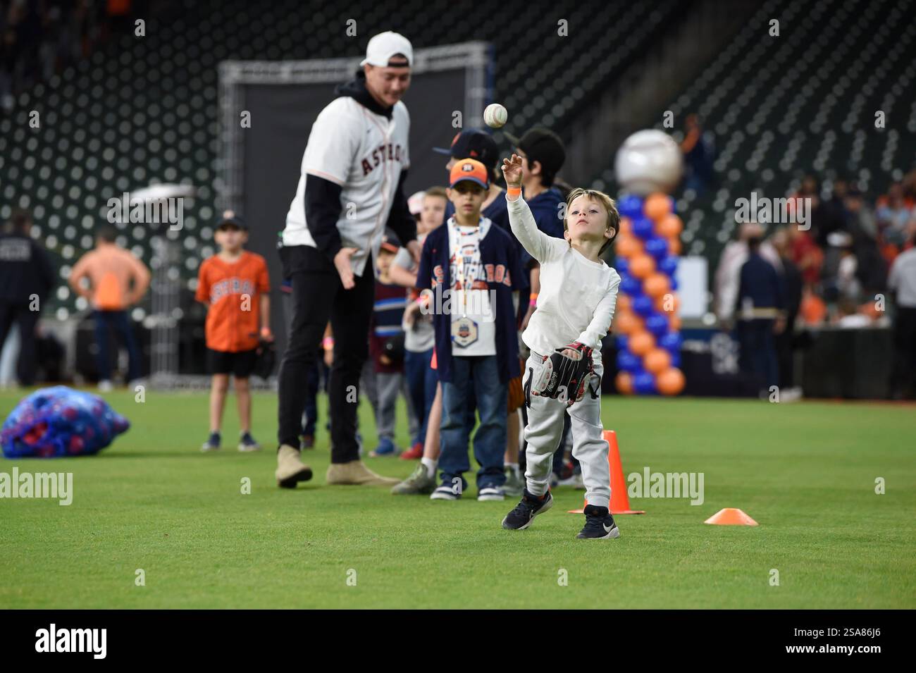 Fans enjoying time on the field during the 2025 Houston Astros FanFest ...