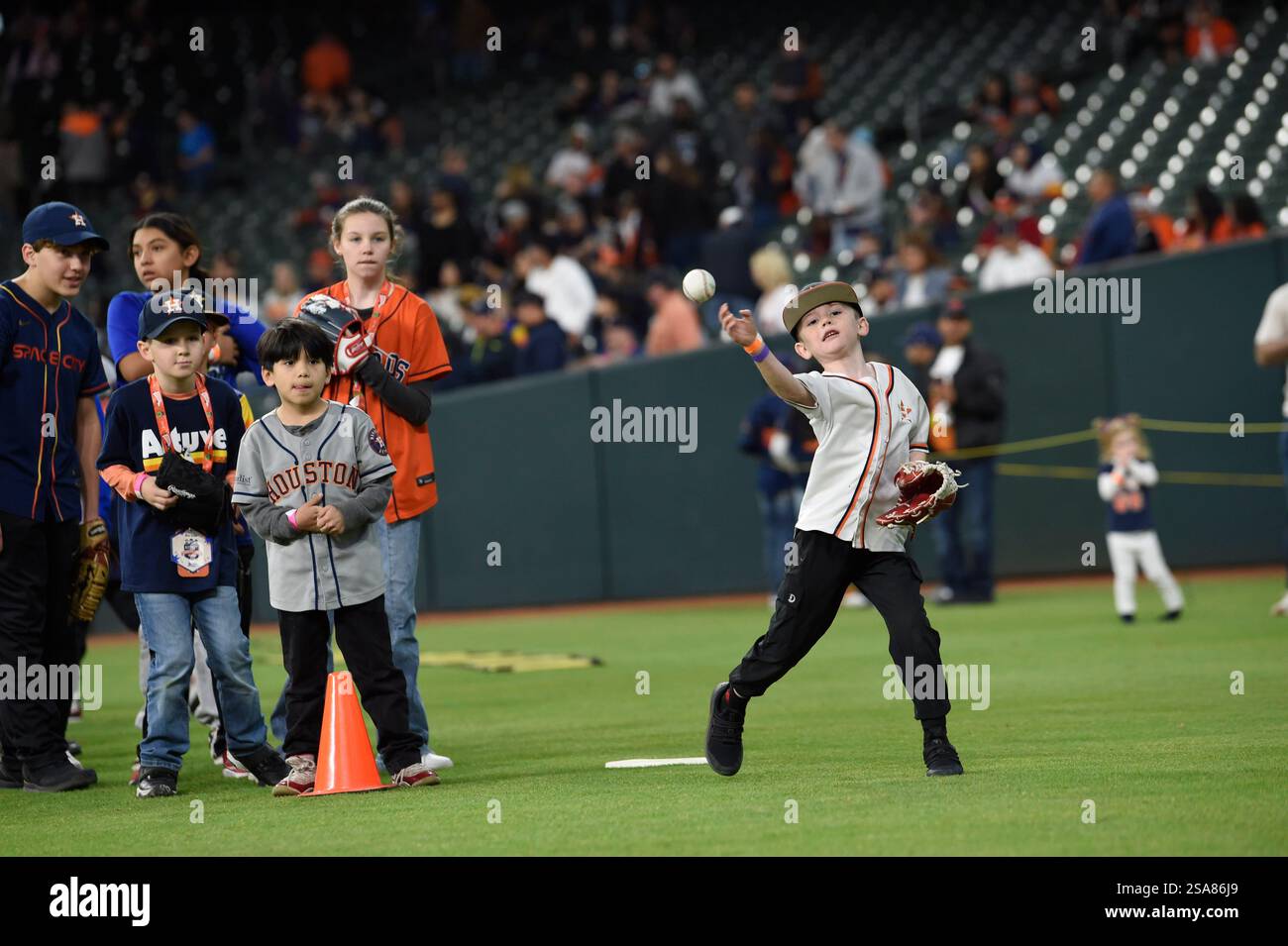 Fans enjoying time on the field during the 2025 Houston Astros FanFest ...