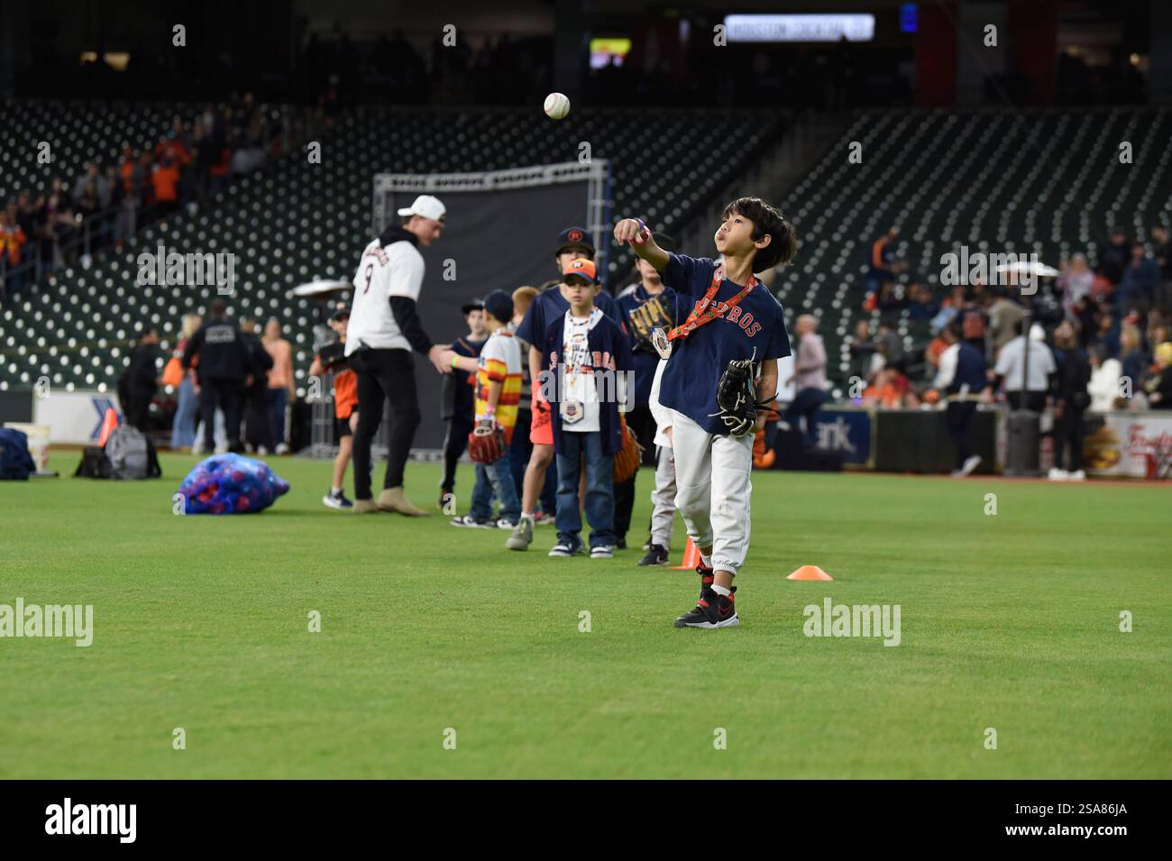 Fans enjoying time on the field during the 2025 Houston Astros FanFest ...