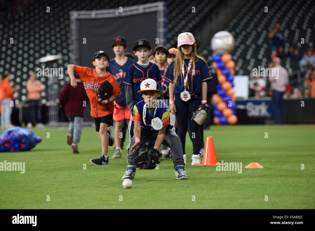 Fans enjoying time on the field during the 2025 Houston Astros FanFest ...