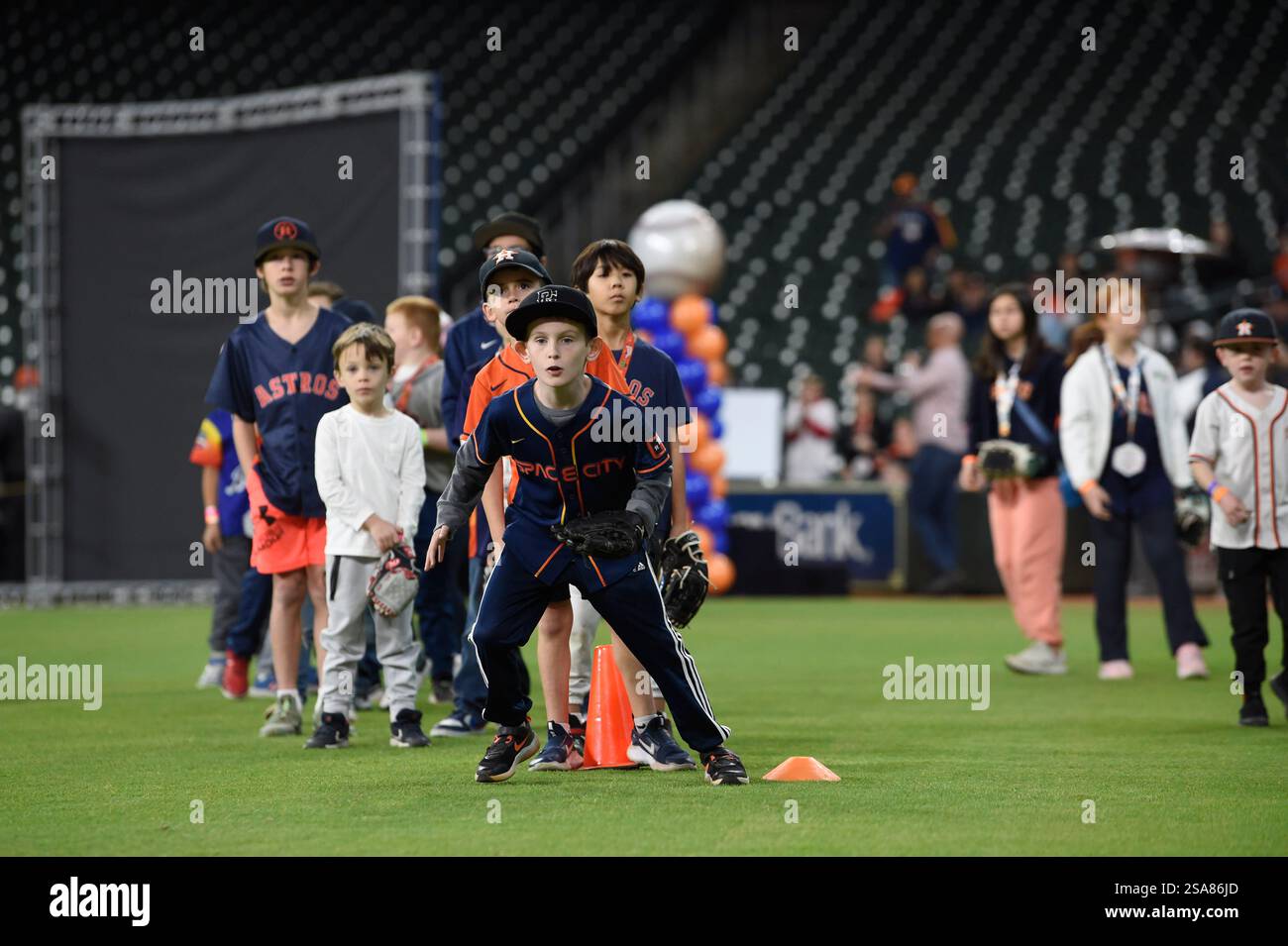 Fans enjoying time on the field during the 2025 Houston Astros FanFest ...