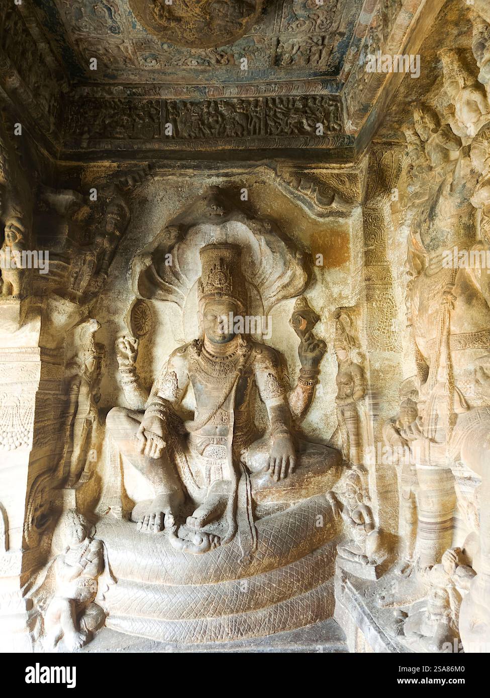 Vishnu seated in Lalitasana, the posture of ""royal ease,"" on the ...