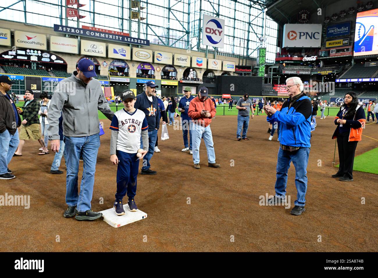 Fans enjoying time on the field during the 2025 Houston Astros FanFest ...
