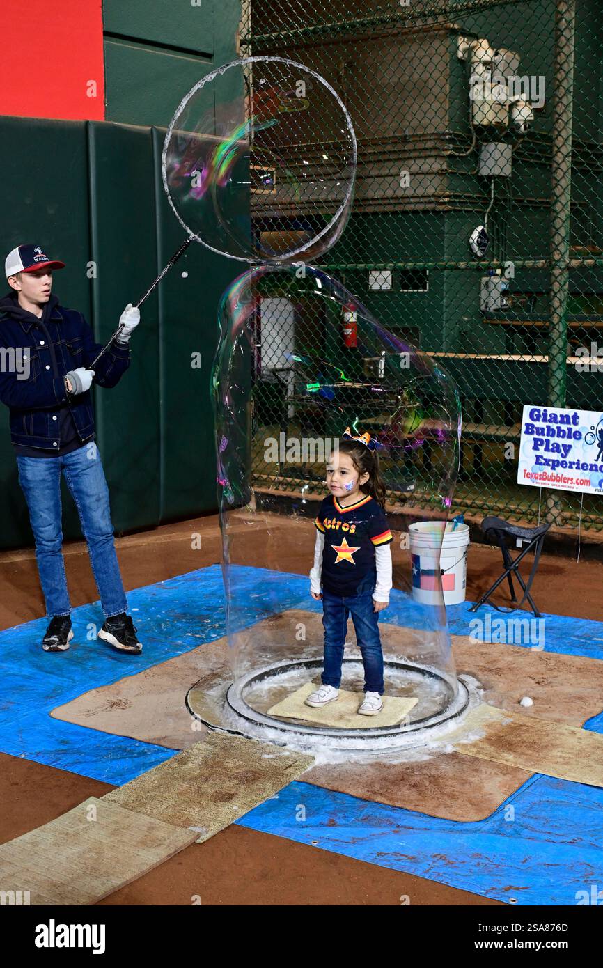 Fans enjoying time on the field during the 2025 Houston Astros FanFest ...
