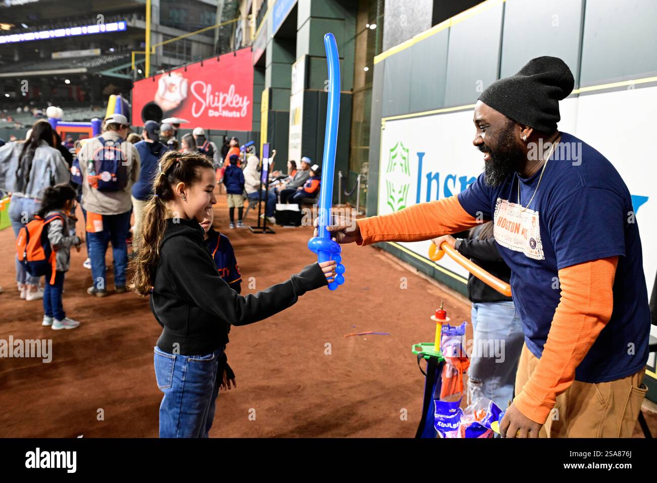 Fans enjoying time on the field during the 2025 Houston Astros FanFest ...
