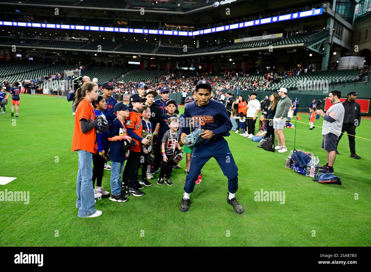 Fans enjoying time on the field during the 2025 Houston Astros FanFest ...