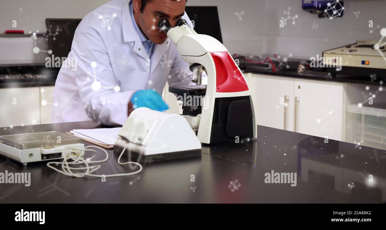 Image of molecules and data processing over biracial male scientist ...