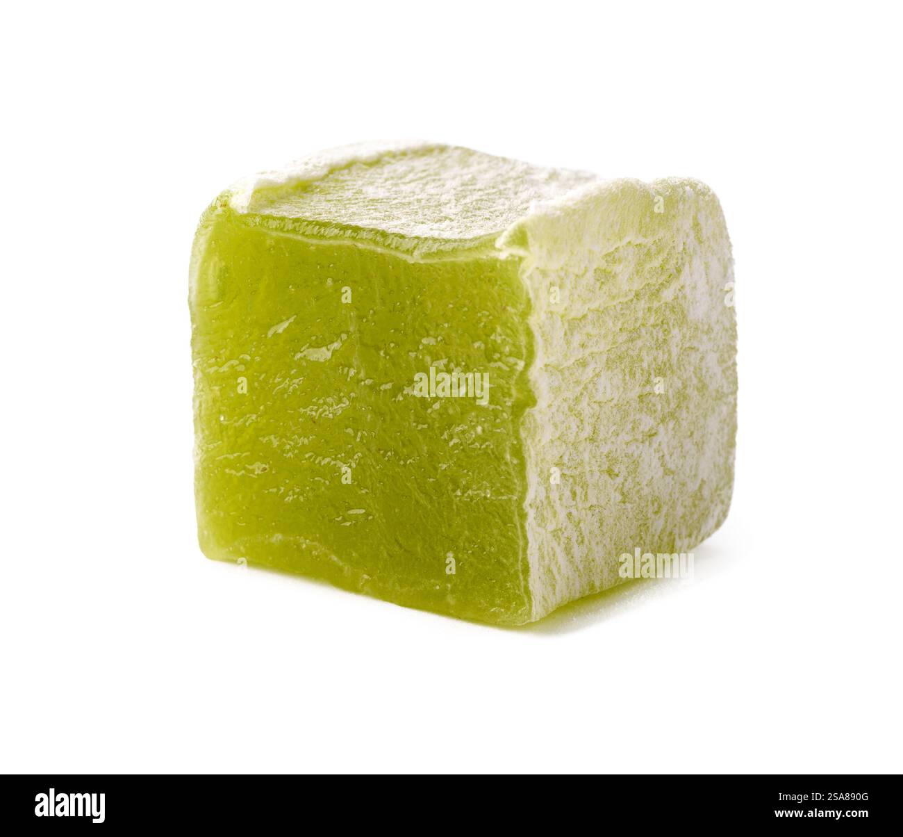 Green gelatin dessert cube placed on a clean surface showcasing its ...