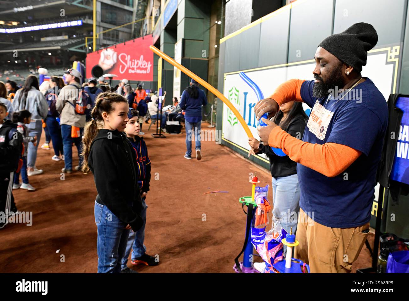 Houston, United States. 25th Jan, 2025. Fans enjoying time on the field ...