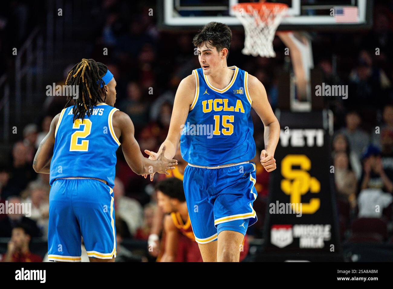 UCLA Bruins center Aday Mara (15) celebrates with guard Dylan Andrews ...
