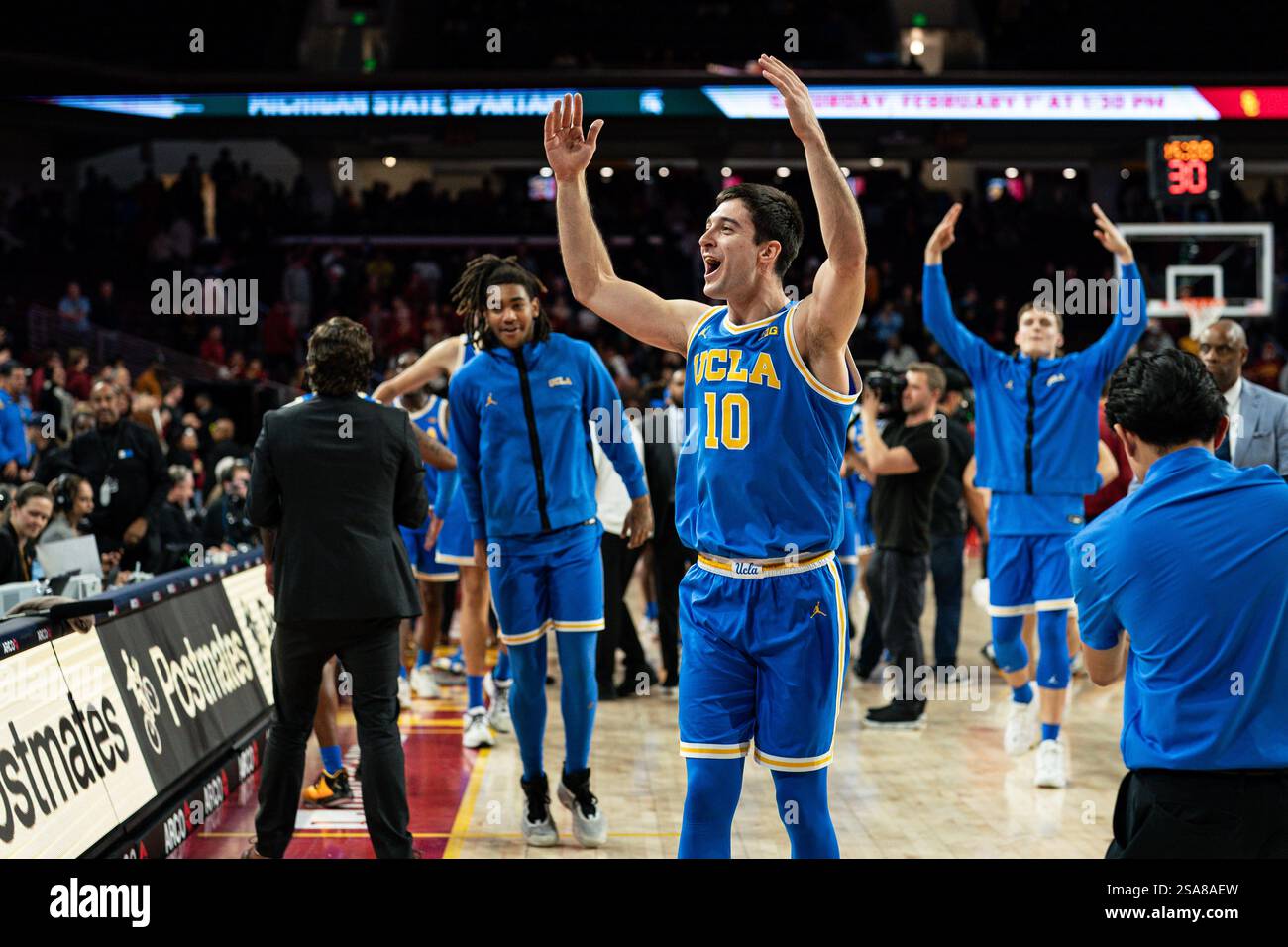 UCLA Bruins guard Lazar Stefanovic (10) celebrates a victory after a ...