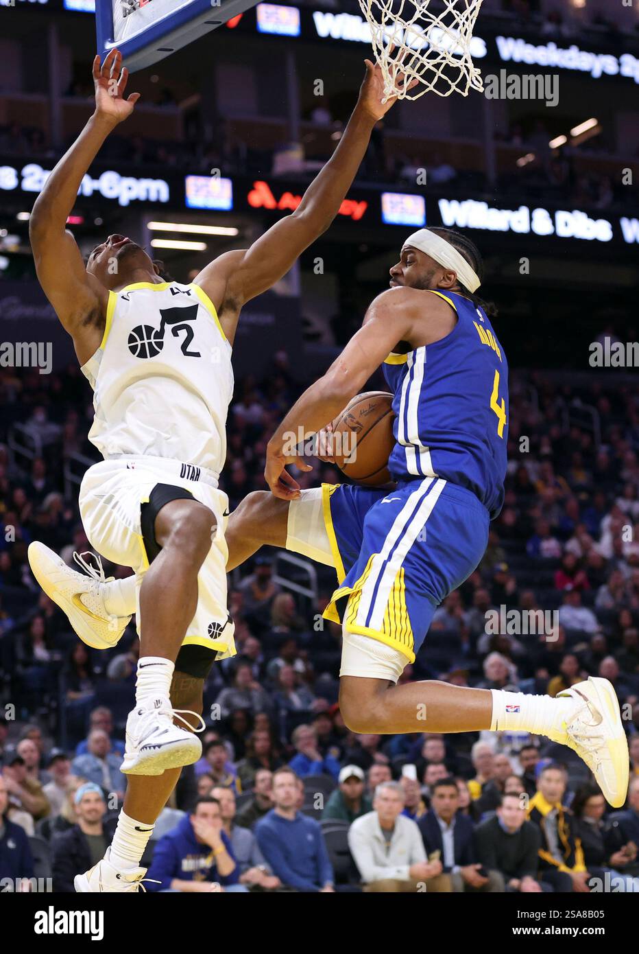 Golden State Warriors' Moses Moody, right, is fouled by Utah Jazz ...