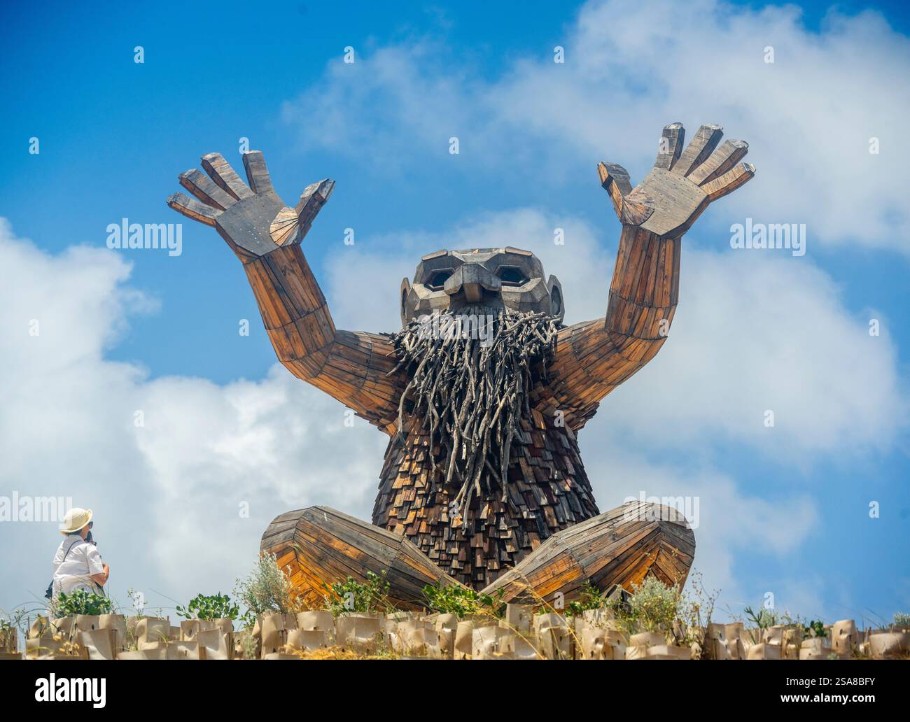 Santi Ikto, The wooden giant sculpture Created by Danish artist, Thomas ...