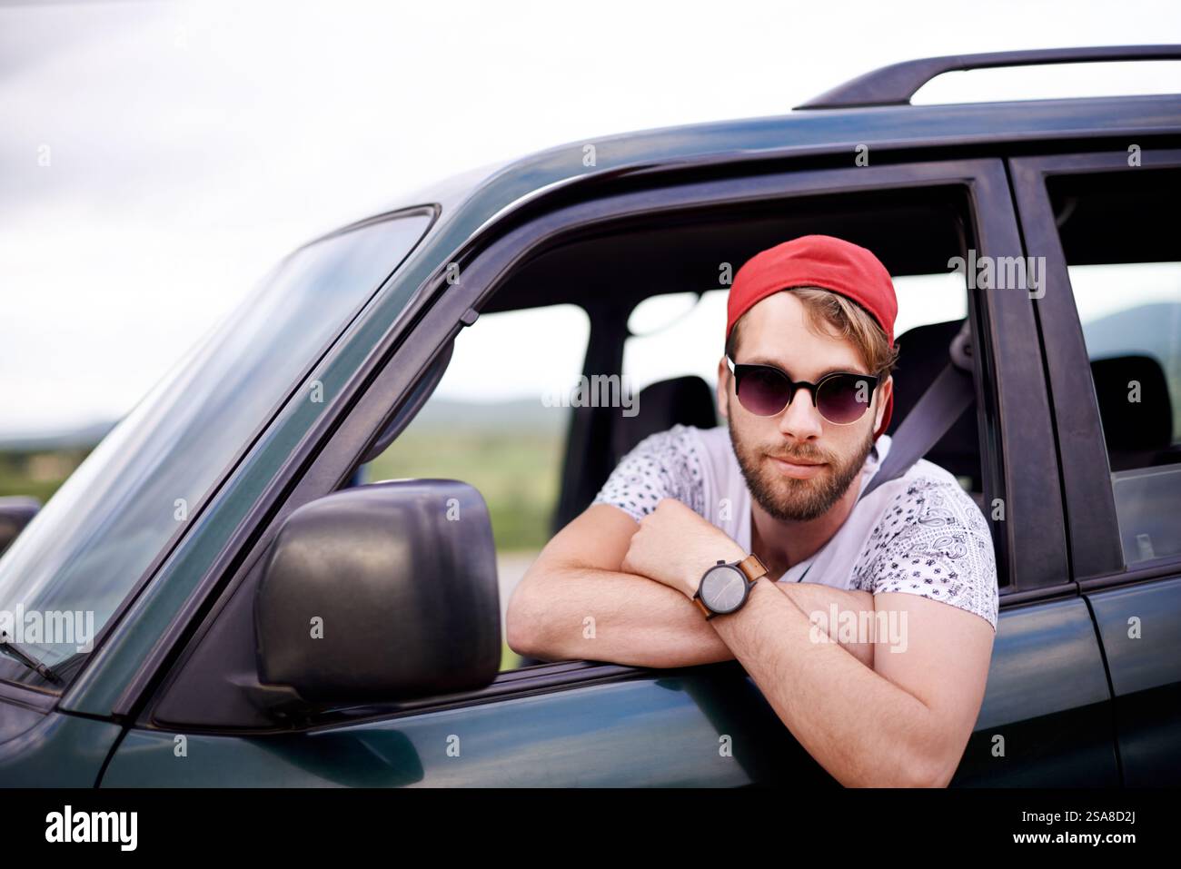 Man, car and portrait in nature for road trip, adventure and travel ...
