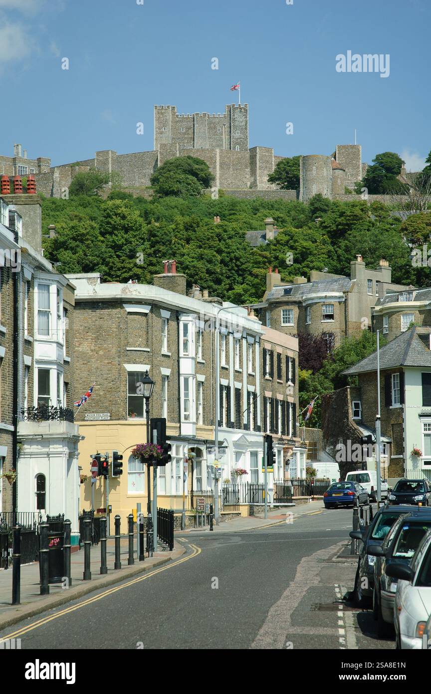 Dover Castle dominates the landscape, perched on a hill above a ...