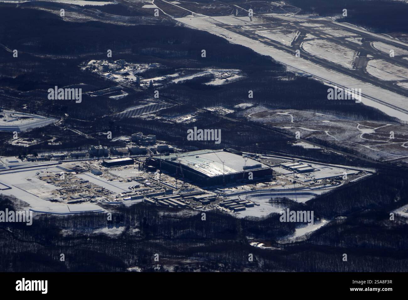 An aerial view shows the construction site of the Rapidus chip factory ...