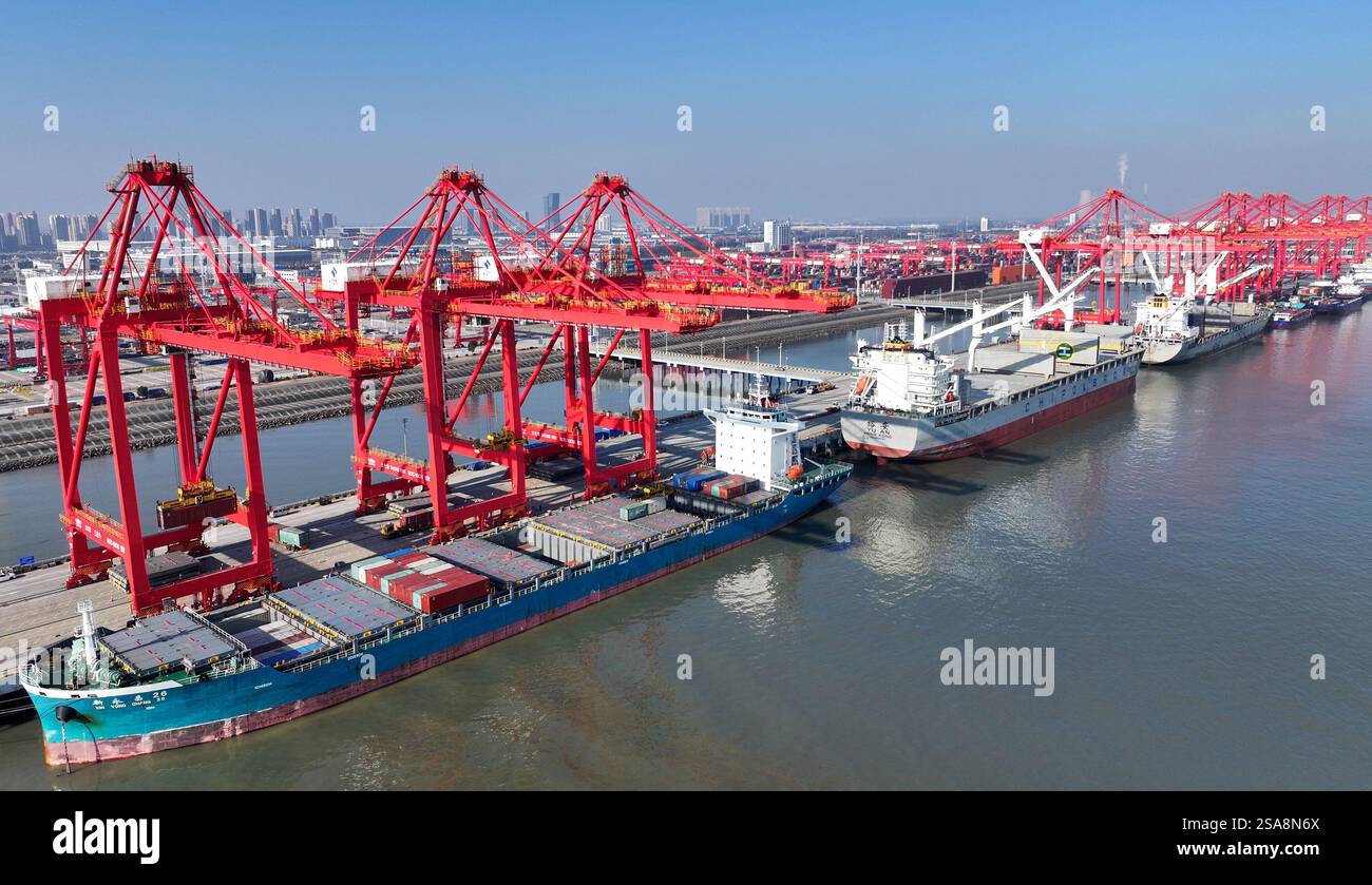 SUZHOU, CHINA - JANUARY 29, 2025 - Cargo ships load and unload ...