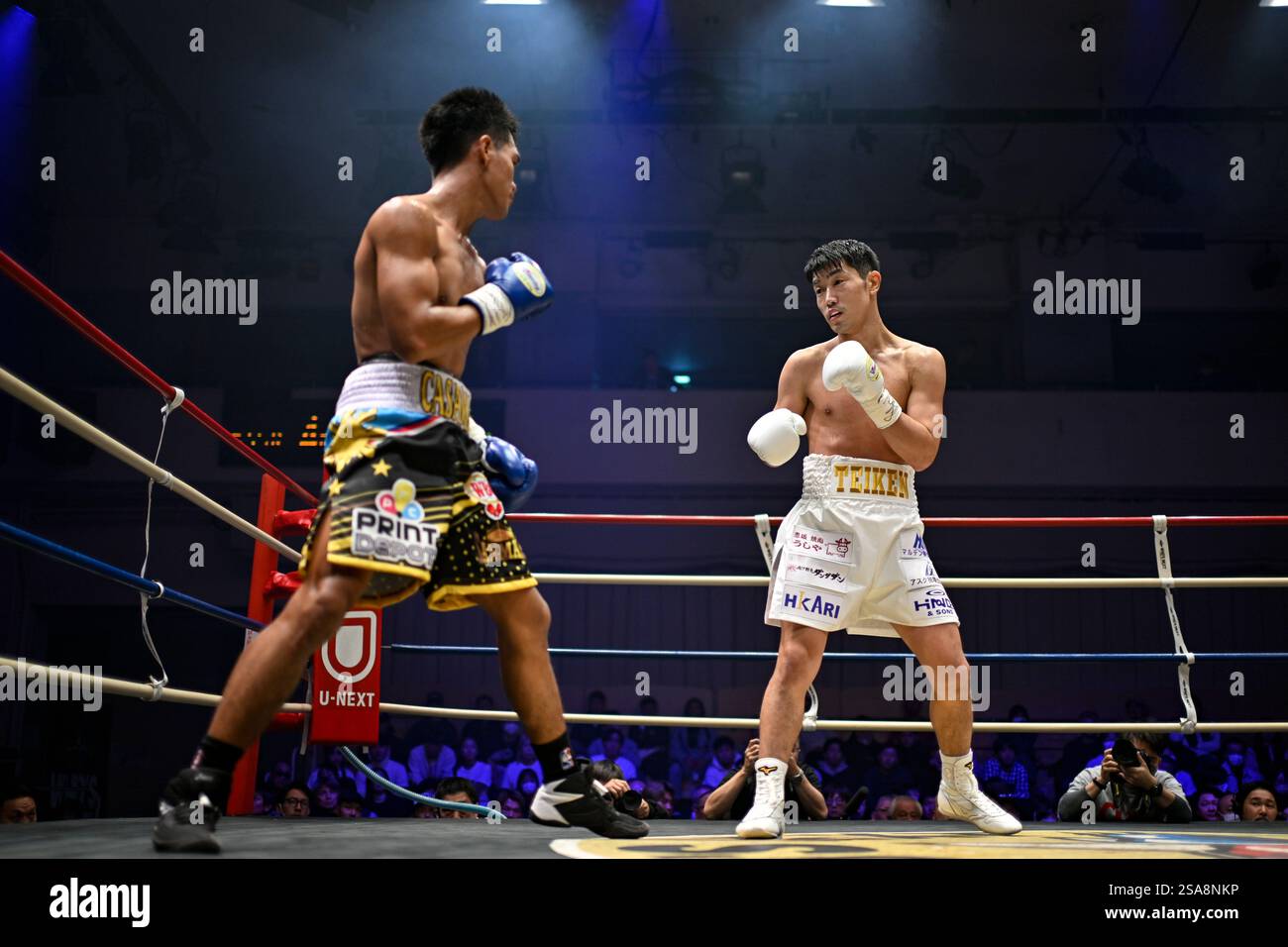 Champion Kenji Fujita (withe gloves) of Japan and challenger Michael ...