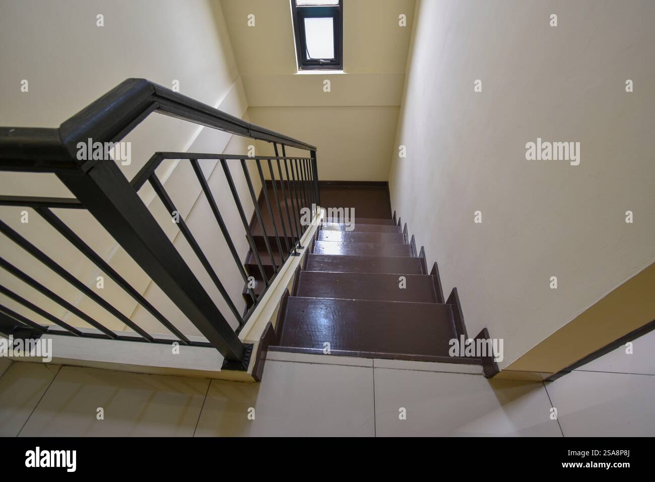 Photographed, simple and elegant of brown wooden stairs (tangga kayu ...