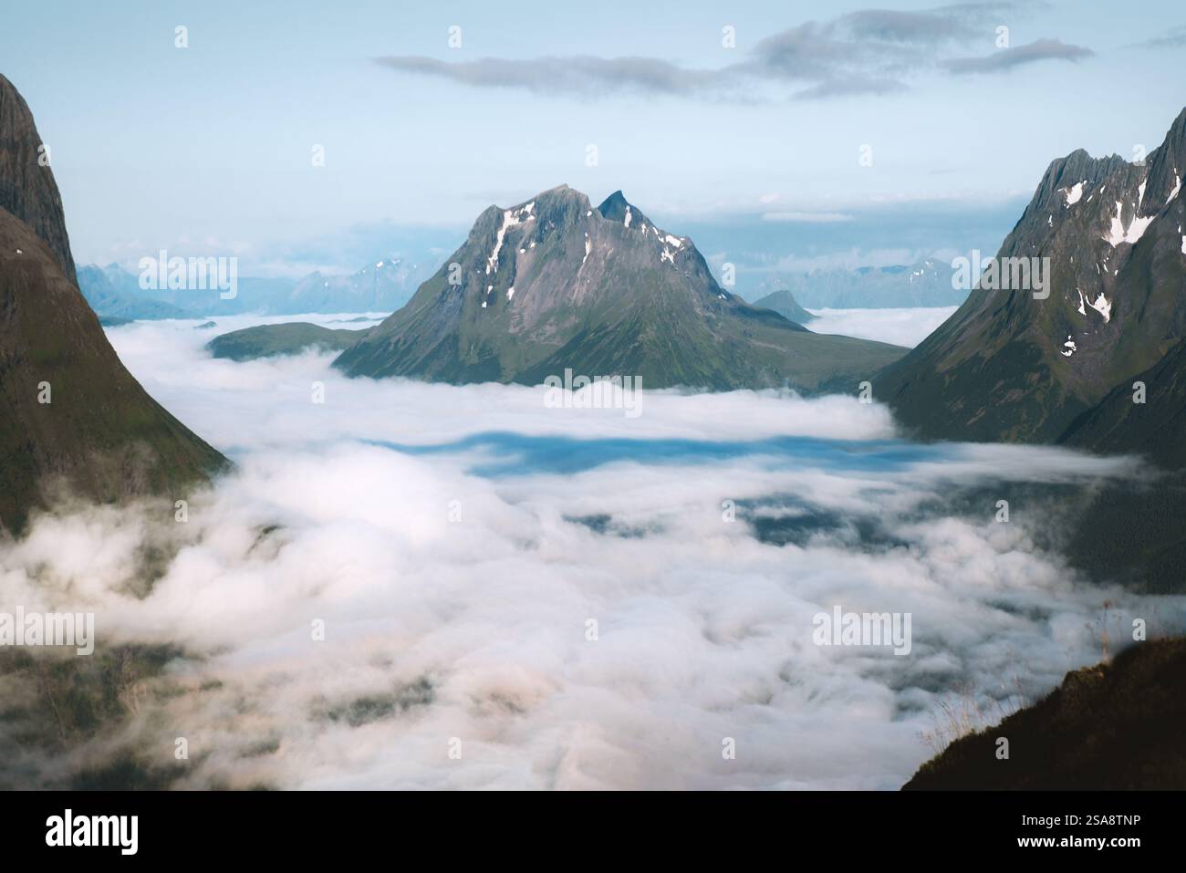 Aerial mountains view above clouds landscape in Norway travel Sunnmore ...