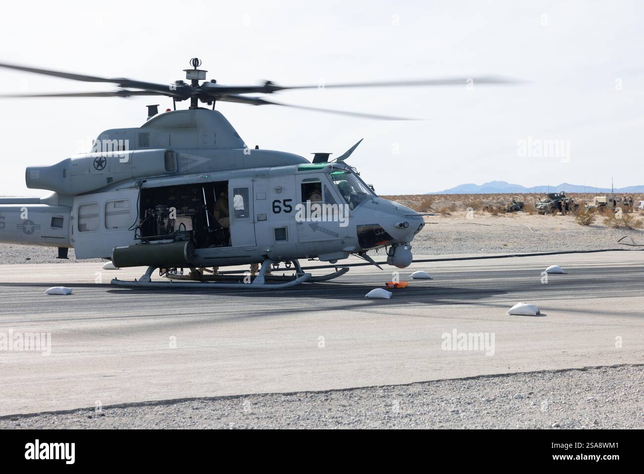 U.S. Marines with Marine Light Attack Helicopter Squadron (HMLA) 269 ...