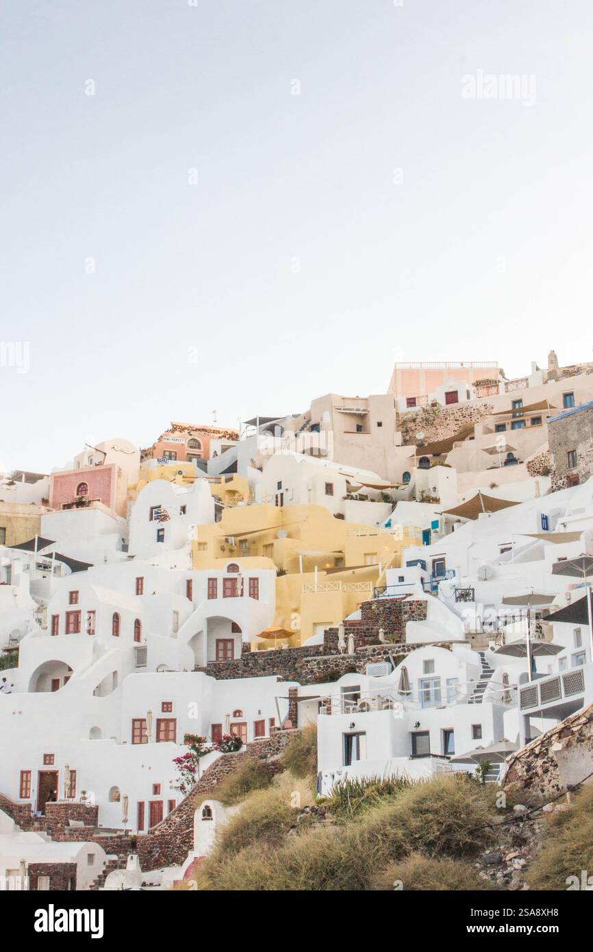 In the cliffside town of Oia in Santorini, Greece, the whitewashed ...