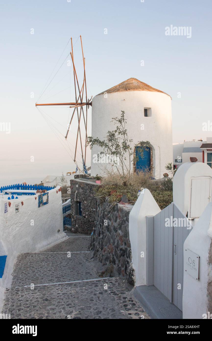 In Santorini, Greece, a cobblestone path leads down the steps to the ...