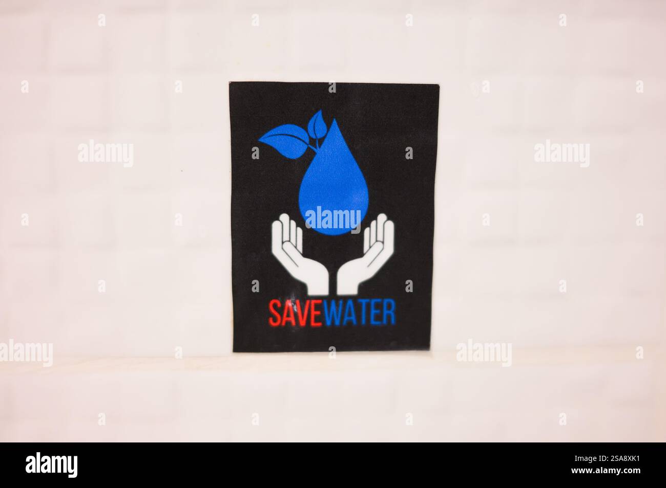 Save water sign on the wall in the hotel. Concept of ecology ...