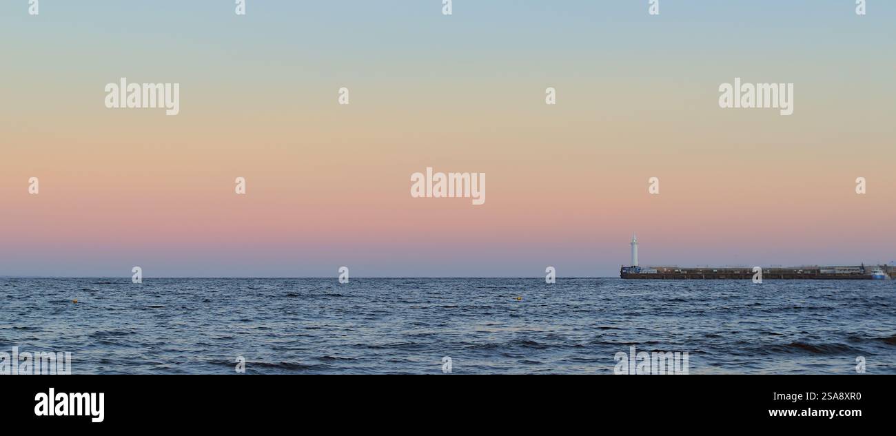 View of Sagami Bay under a dusk sky in Kanagawa, Japan, with the Shonan ...