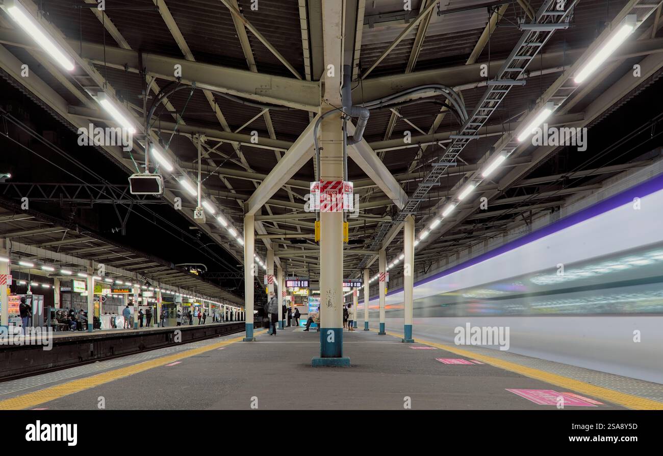 Long exposure night view from the end of a platform at Asagaya station ...