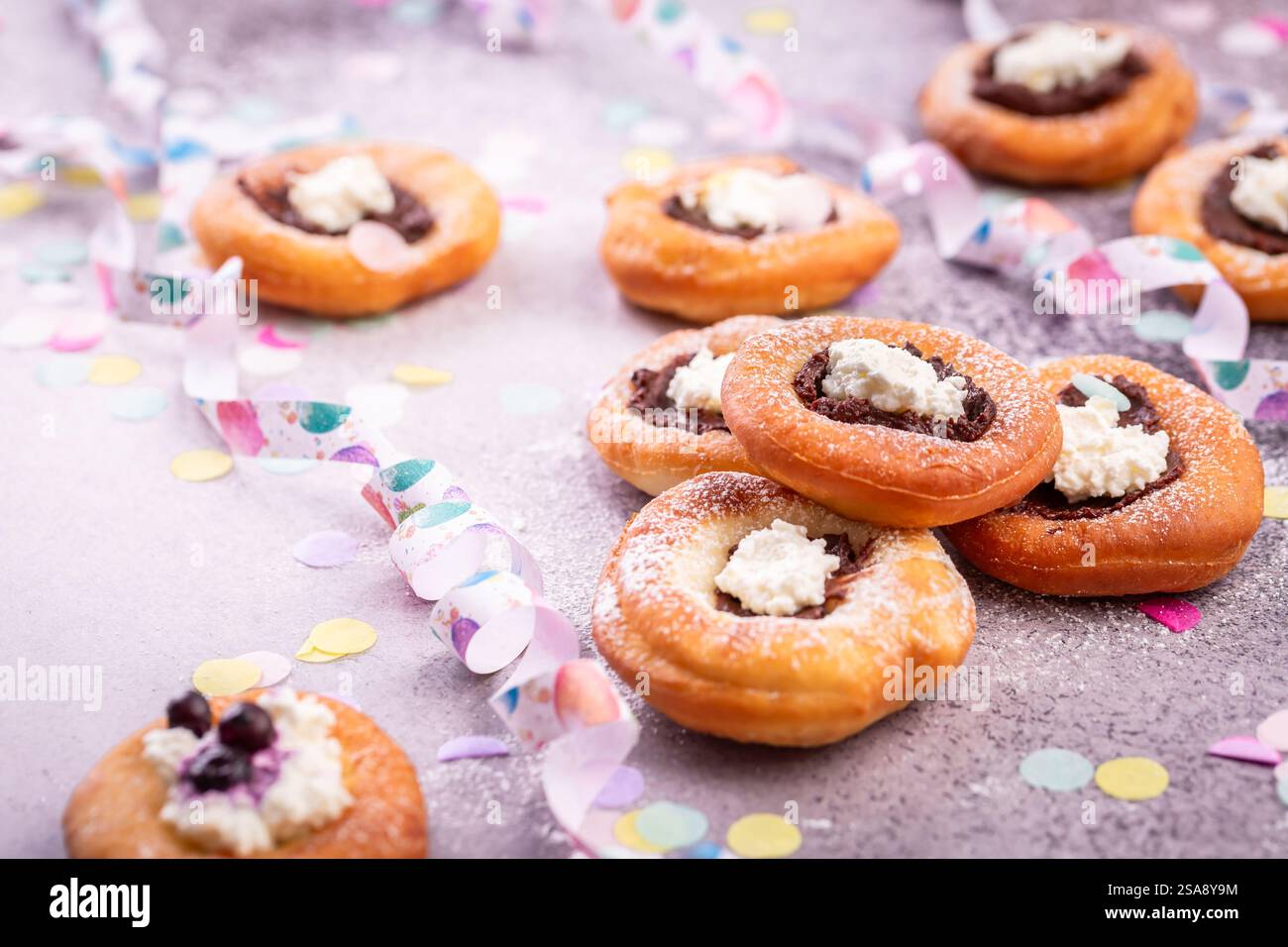 Carnival powdered sugar raised donuts with jelly and cream cheese ...