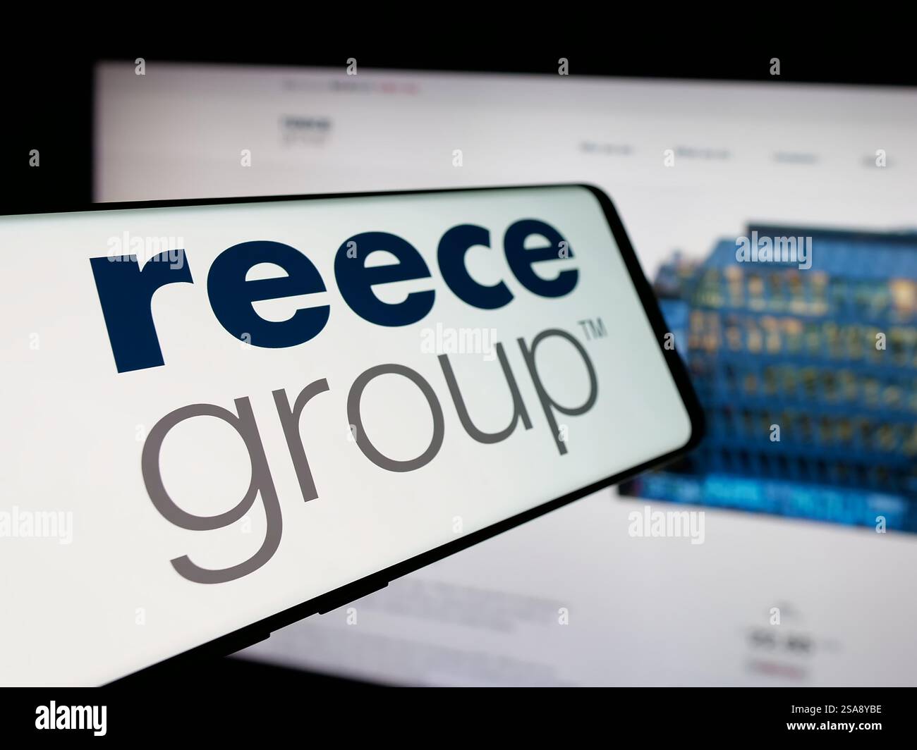 In this photo illustration, a smartphone with the logo of plumbing and ...