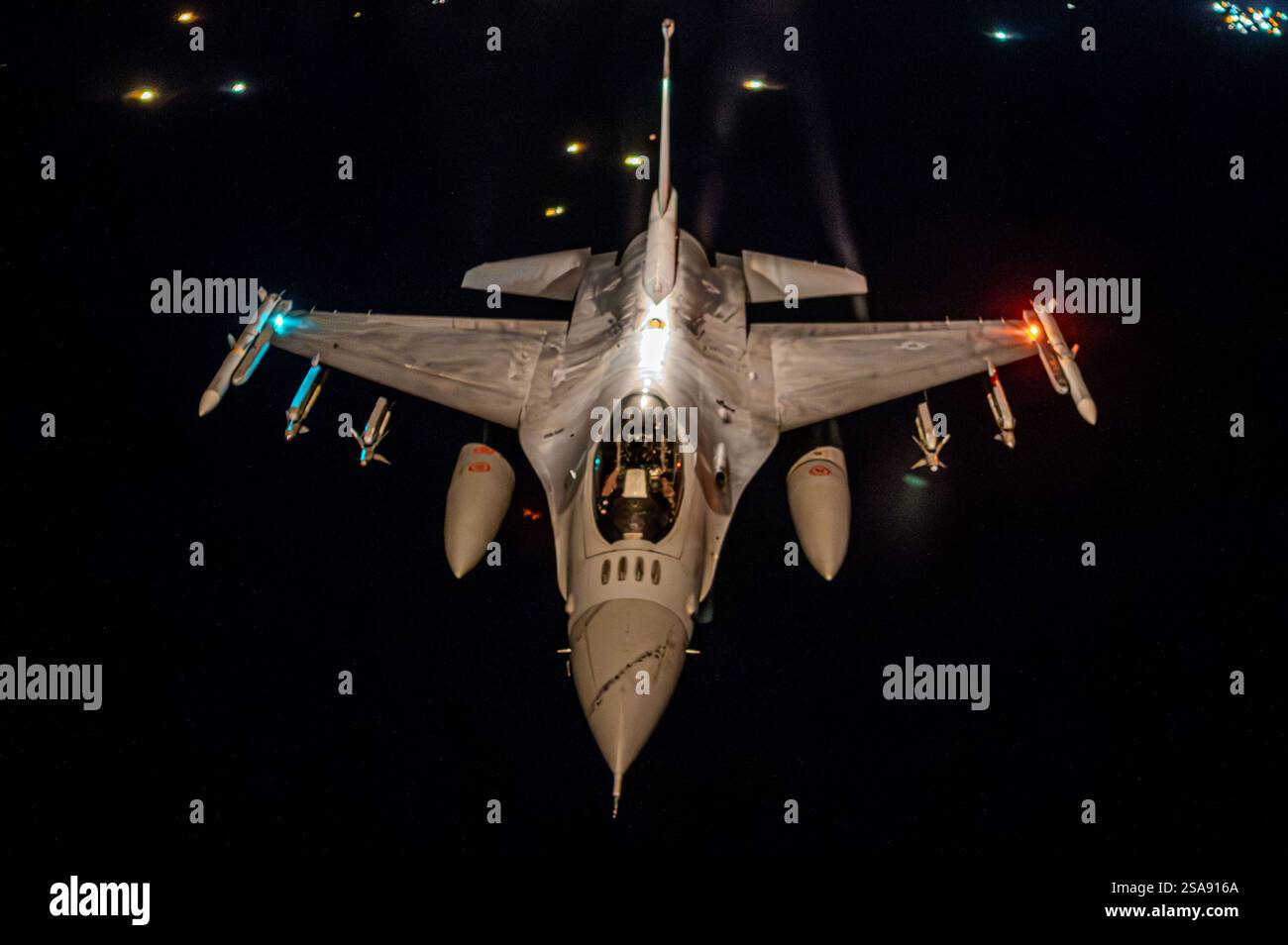 A U.S. Air Force F-16 Fighting Falcon flies a presence patrol over the ...