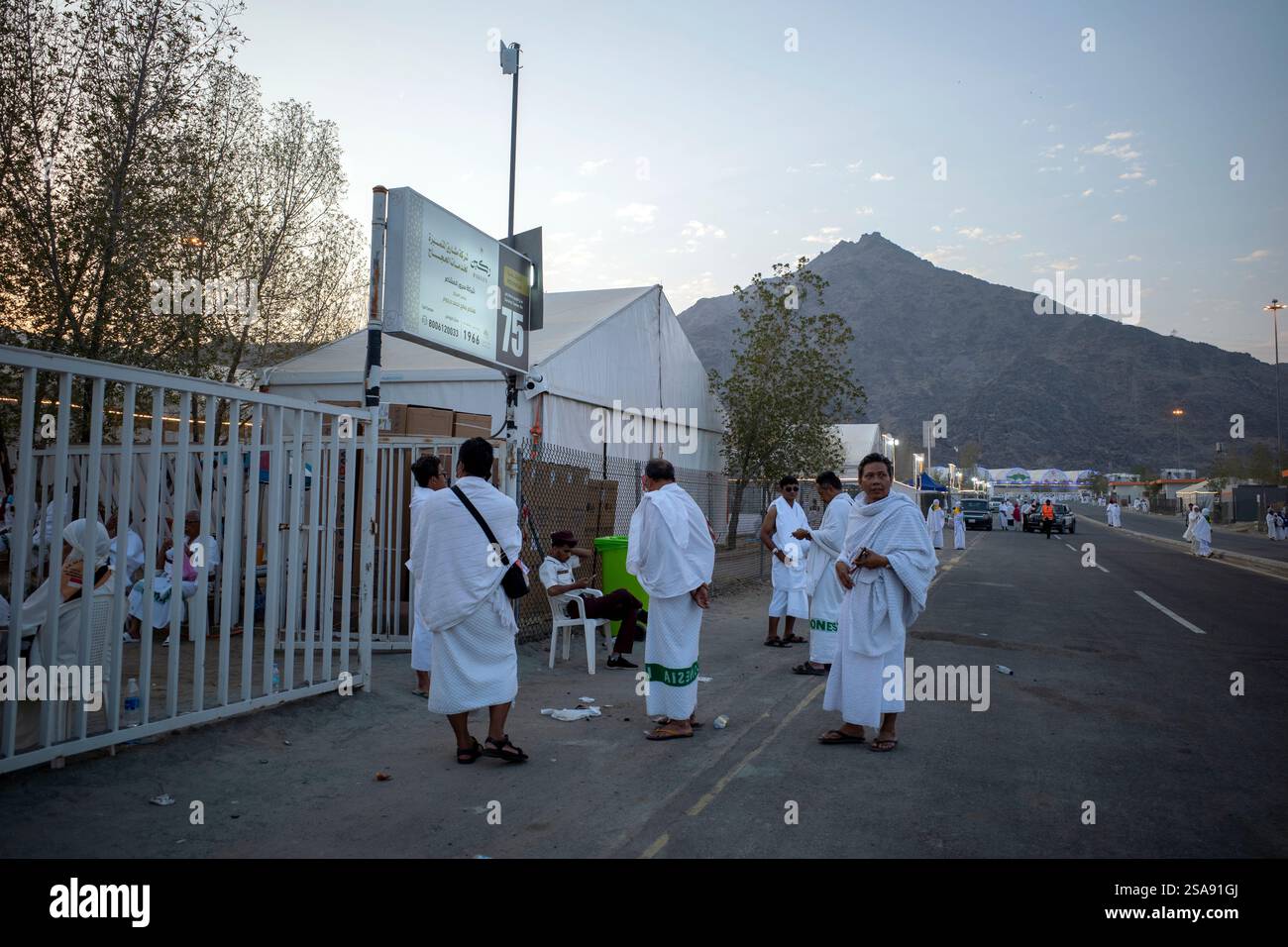 Mecca, Saudi Arabia - June 15, 2024: Hajj pilgrims from Indonesia near the tents in Arafat ...