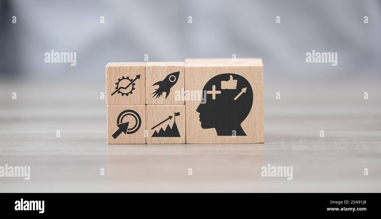 Wooden blocks with symbol of motivation concept Stock Photo - Alamy