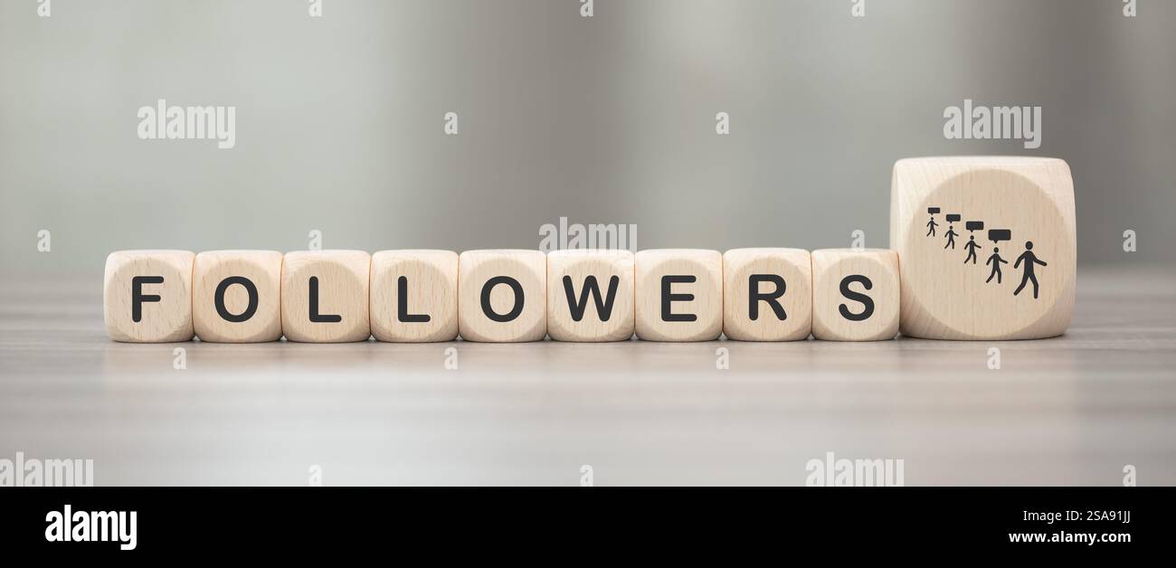 Wooden blocks with symbol of followers concept Stock Photo - Alamy