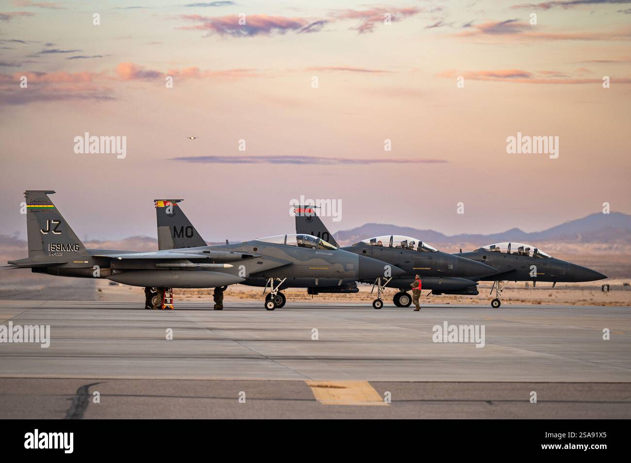 An F-15C Eagle (left) assigned to the 159th Fighter Wing, Louisiana Air National Guard, Naval ...