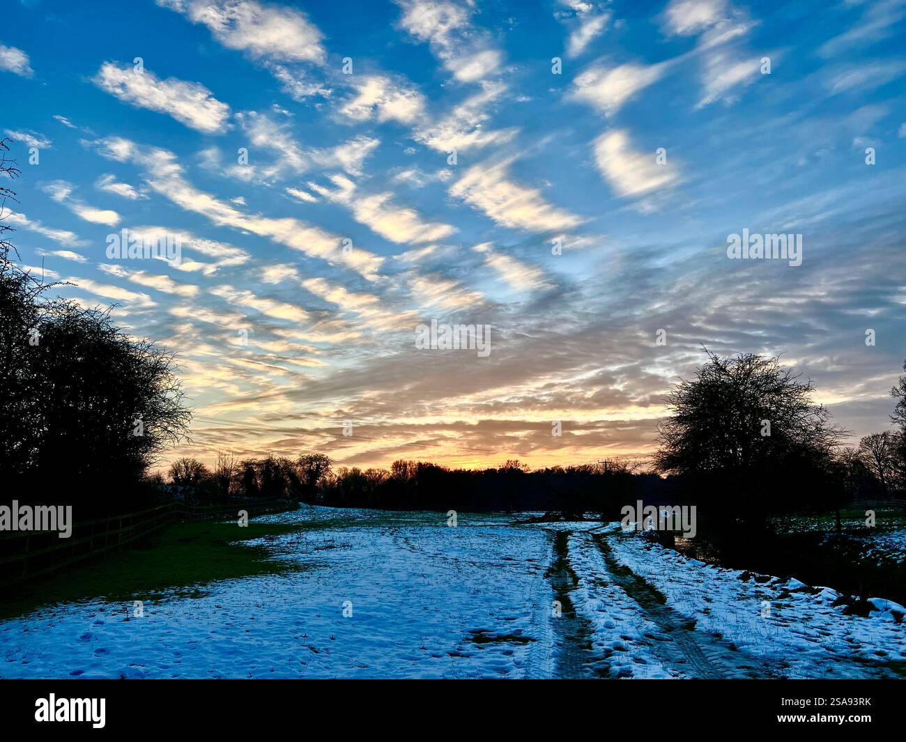 Dramatic sunset sky covered smartphone stock photos and images - Alamy